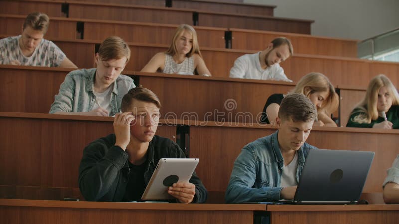 A Large Group of Students during the Break Communicate with Each Other ...