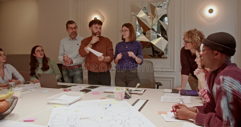 Large Group of Multi Generational Business Team Collaborating and ...