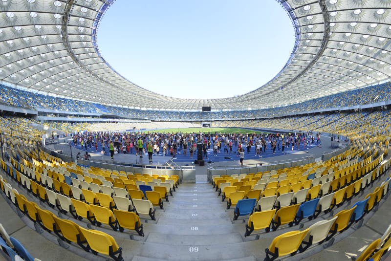 Large Group of People Doing Morning Exercises on the Stadium Editorial ...