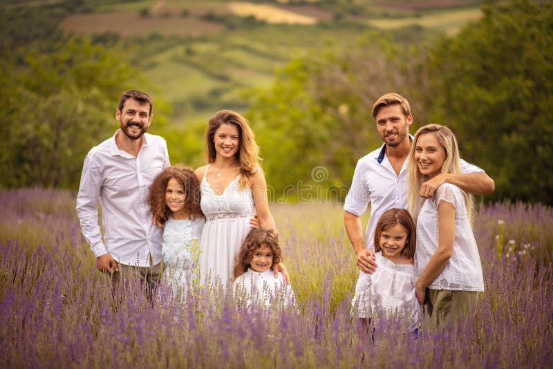Group of People Standing in Lavender Filed Stock Photo - Image of ...