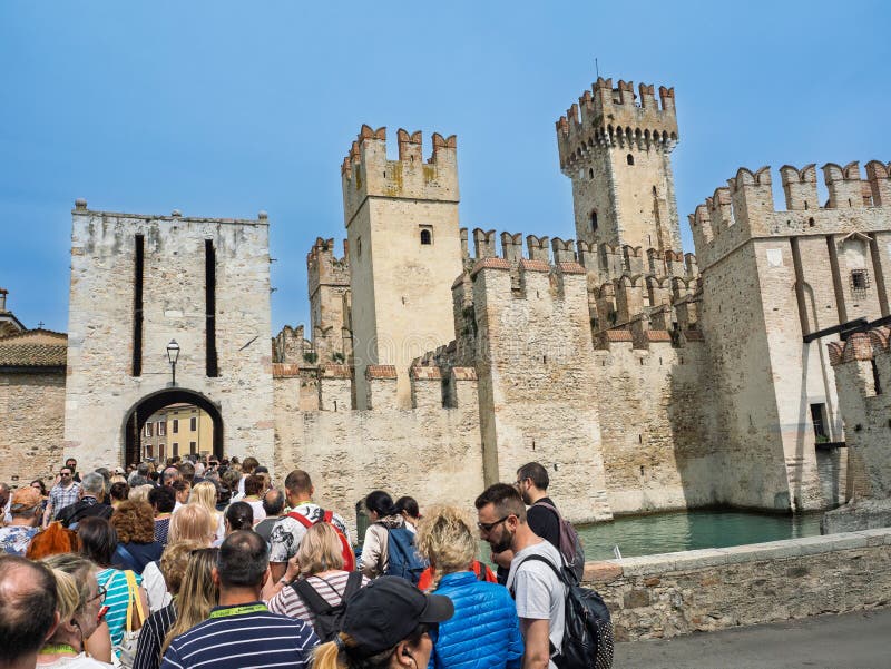 Large Group of People Visiting Ancient Sirmione Castle, Italy Editorial ...