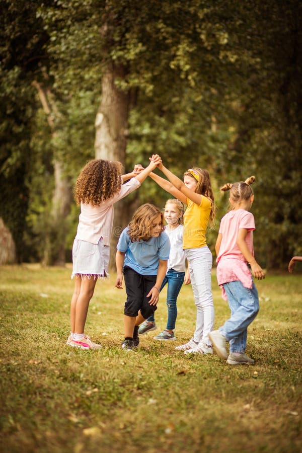Group of School Kids Having Fun in Nature. Focus is on Foreground ...
