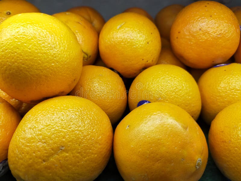 Large Group of Sunkist Close Up at the Market Stock Photo - Image of ...