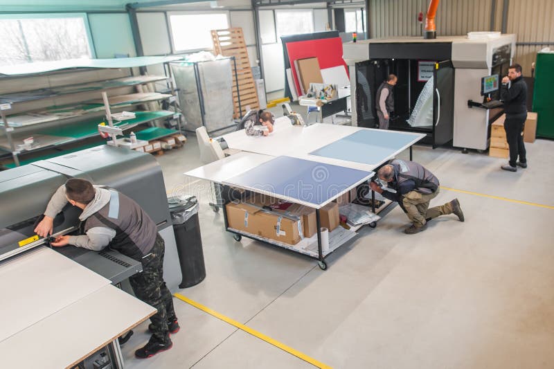 Large Group of Technicians Works in Printing Printshop Press Hall Stock ...