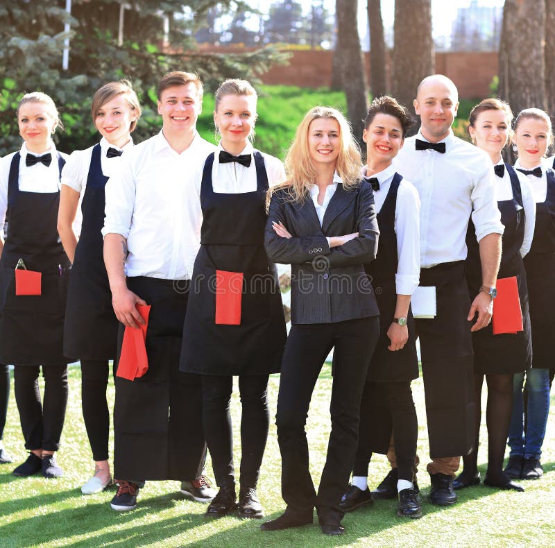 Large Group of Waiters and Waitresses Standing in Row. Stock Image ...
