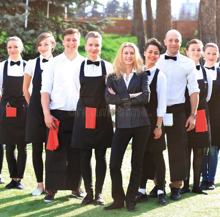 Large Group of Waiters and Waitresses Standing in Row. Stock Image ...