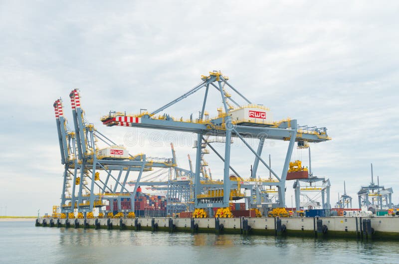Large harbor cranes editorial stock photo. Image of cloud - 65438803