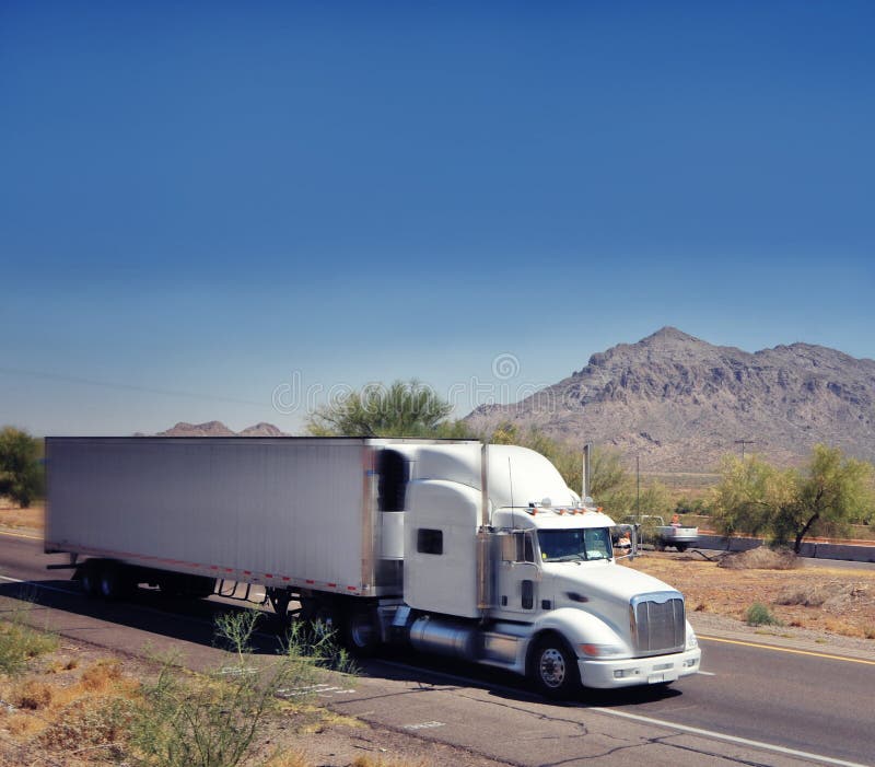 Large Heavy Goods Freight Truck Speeding through a Stock Image - Image ...