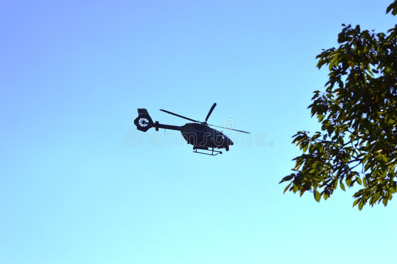 Large helicopter in flight stock photo. Image of airshow - 289395630
