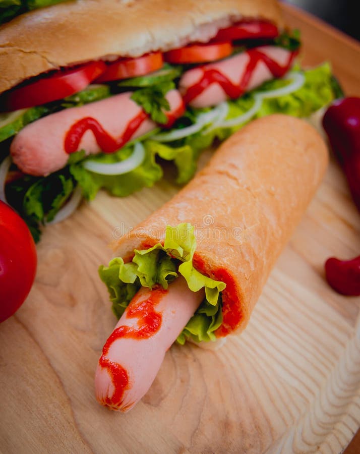 Large Hot Dog with Vegetables on the Table. Stock Image - Image of ...