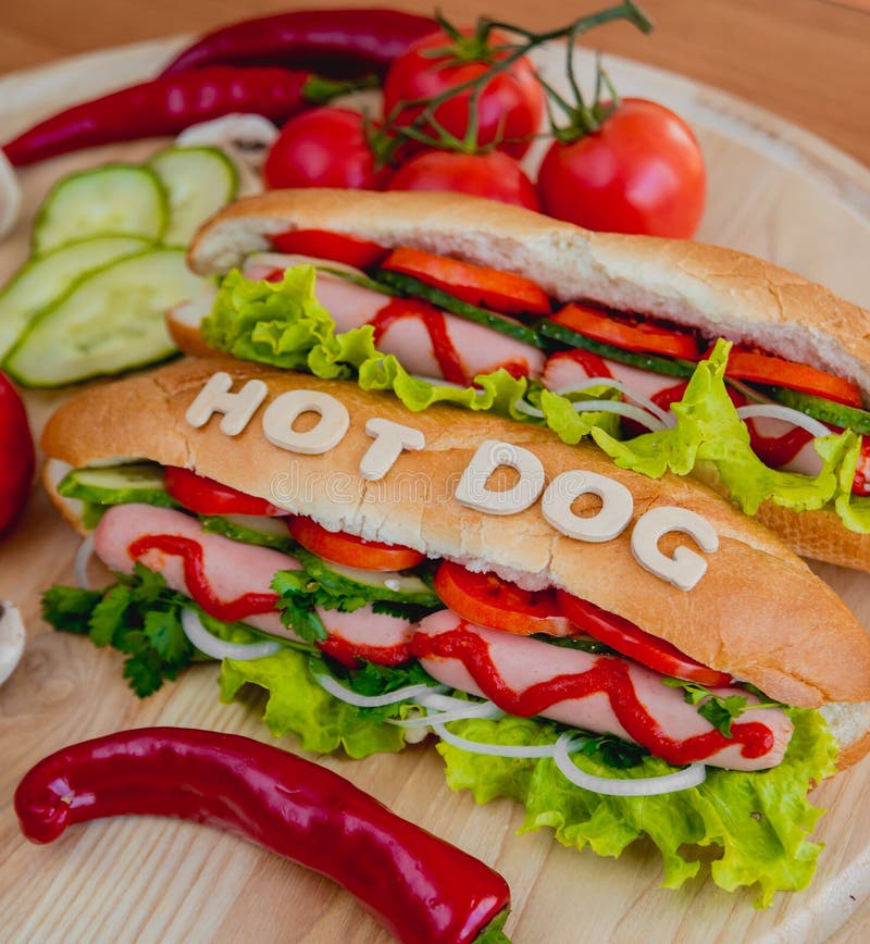 Large Hot Dog with Vegetables on the Table. Stock Image - Image of ...
