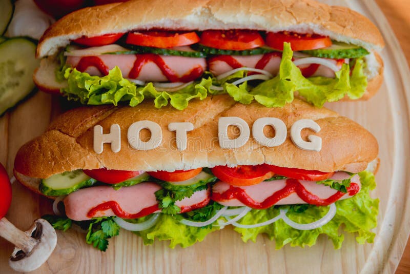 Large Hot Dog with Vegetables on the Table. Stock Image - Image of ...