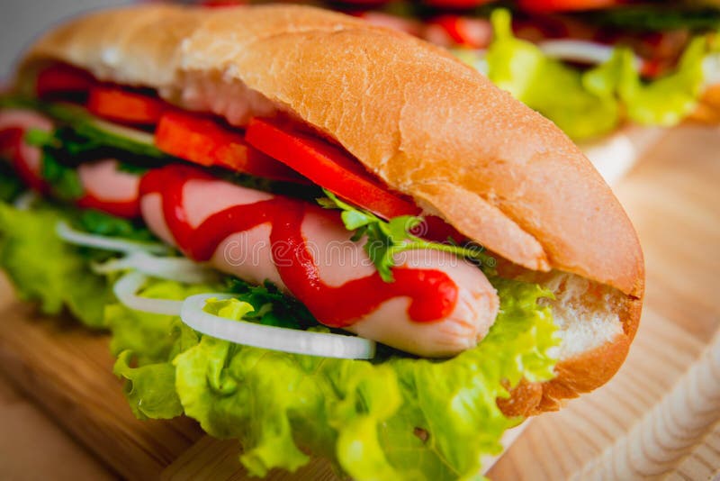 Large Hot Dog with Vegetables on the Table. Stock Image - Image of ...
