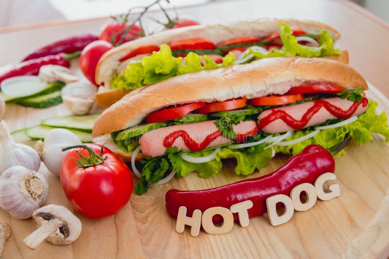 Large Hot Dog with Vegetables Stock Photo - Image of gourmet, chip ...