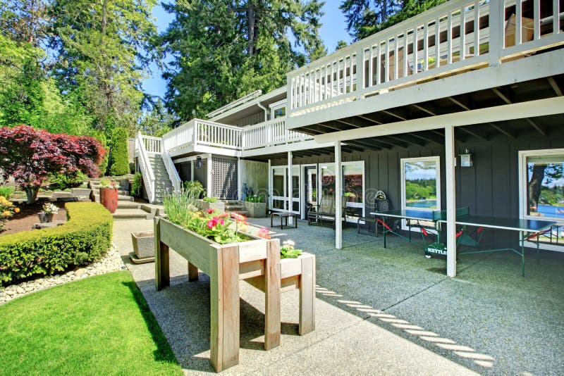 Large House Back Yard with Two Decks and Flower Boxes. Stock Image ...