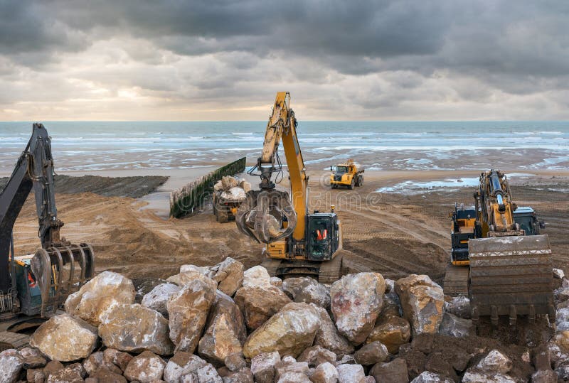 Large Hydraulic Excavators Working As a Team on a Construction Site ...