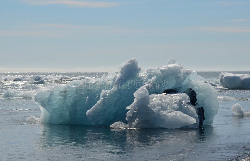 Large Ice Chunk Just Off Shore in Iceland Stock Photo - Image of ...
