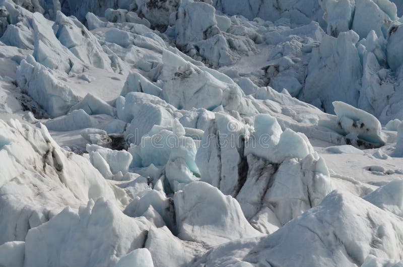 Large Ice Chunks after Ice Fall on a Glacier Stock Photo - Image of ...