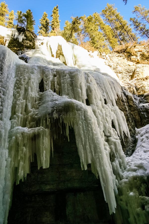 A Large Ice Formation with Icicles Hanging from it Stock Photo - Image ...