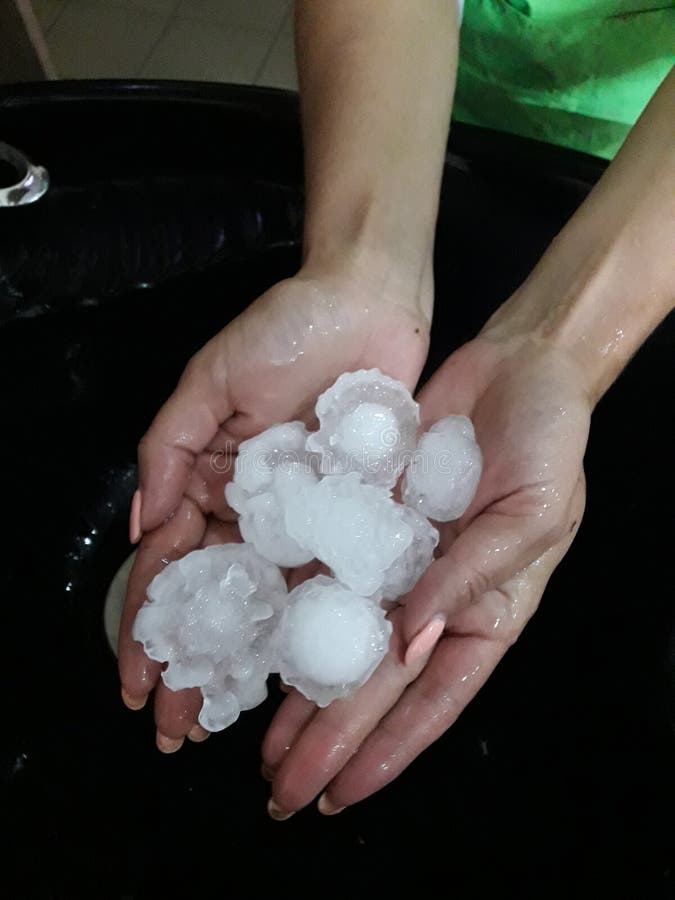 Large Ice Hail in Female Hands Stock Photo - Image of season, danger ...