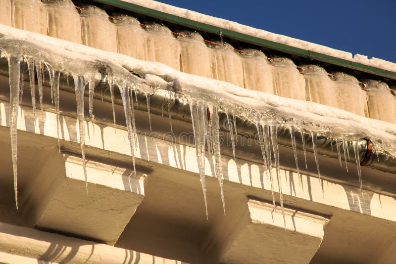 Large Icicles on the Roof Edge Closeup Stock Image - Image of long ...