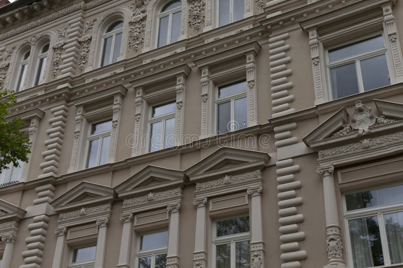 A Large and Impressive Building Featuring Numerous Windows and Columns ...