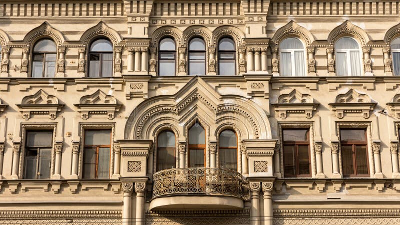 A Very Large Building that Features Numerous Windows and a Balcony ...