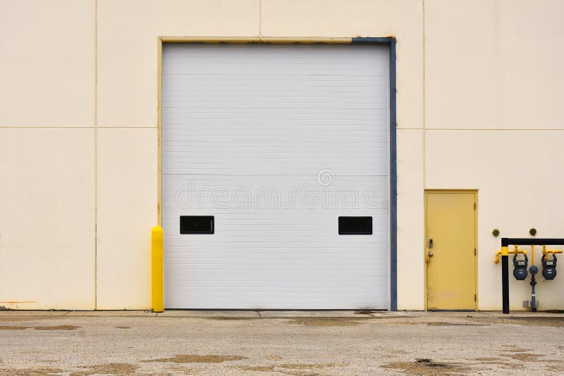 Large Industrial Bay Doors stock image. Image of load - 189045413