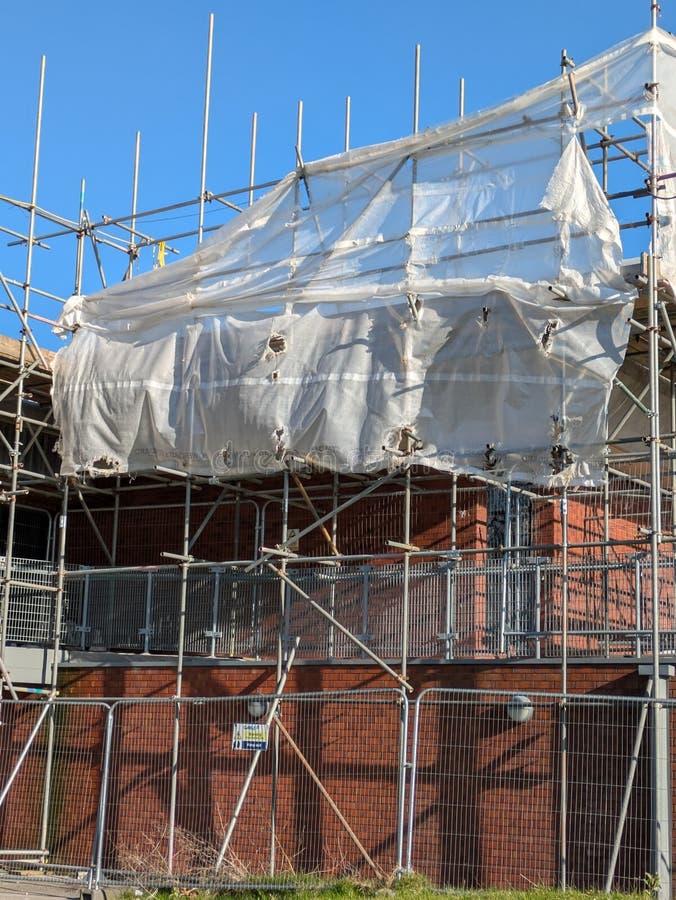 Large Industrial Building Covered and Surrounded with Scaffolding Stock ...