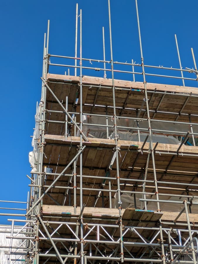 Large Industrial Building Covered and Surrounded with Scaffolding Stock ...