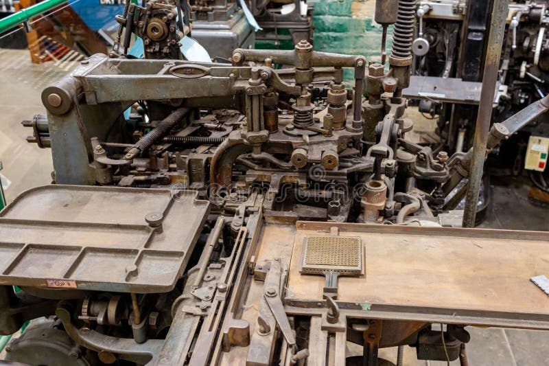 A Very Large Machine in a Building that Has Lots of Tools on it Stock ...