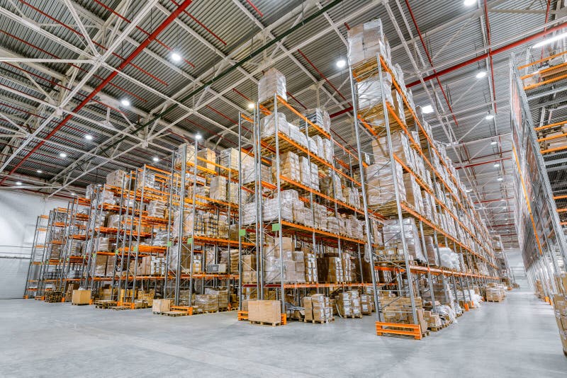 Large Industrial Warehouse. Tall Racks are Completely Filled with Boxes ...
