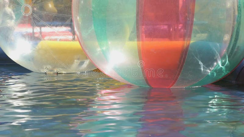 Large Inflatable Balloons with Children Swimming in the Pool Stock ...