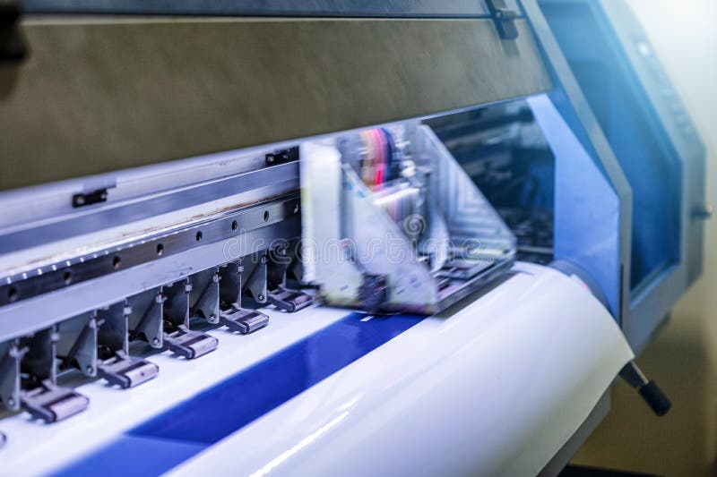 Large Inkjet Printer Printing Blue Color on Vinyl Paper Stock Image ...