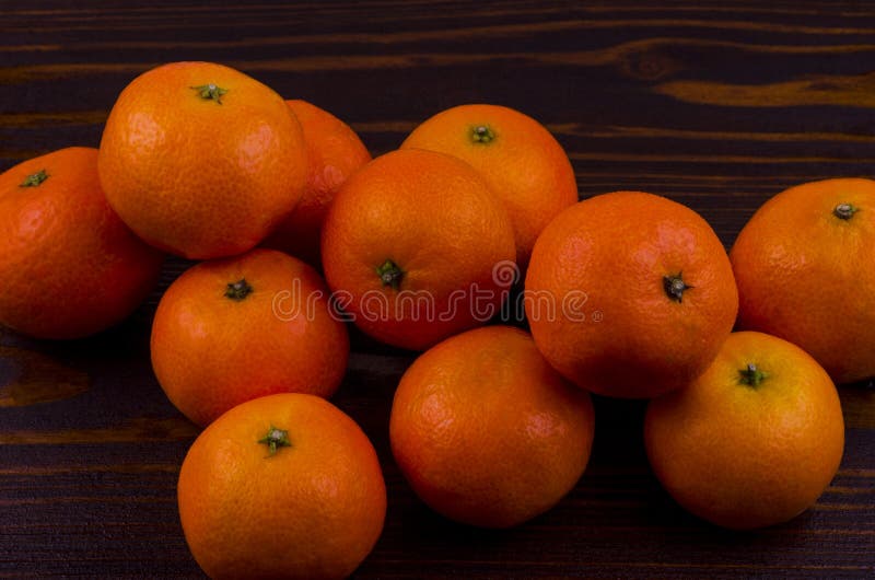 Large Juicy Tangerines on a Wooden Background Stock Photo - Image of ...
