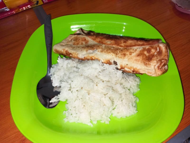 Large Kebab with Rice on a Plate and Spoo Stock Image - Image of food ...