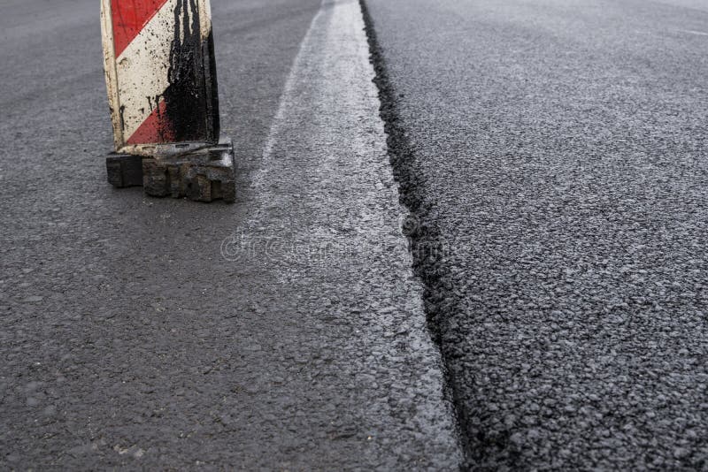 A Large Layer of Fresh Hot Asphalt. Layer of Asphalt Raw Material in a ...