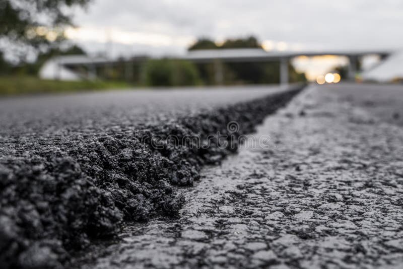 A Large Layer of Fresh Hot Asphalt. Layer of Asphalt Raw Material in a ...