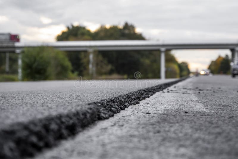 A Large Layer of Fresh Hot Asphalt. Layer of Asphalt Raw Material in a ...