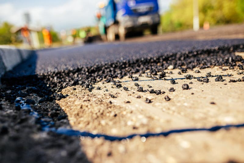 A Large Layer of Fresh Hot Asphalt. Road Construction Stock Image ...
