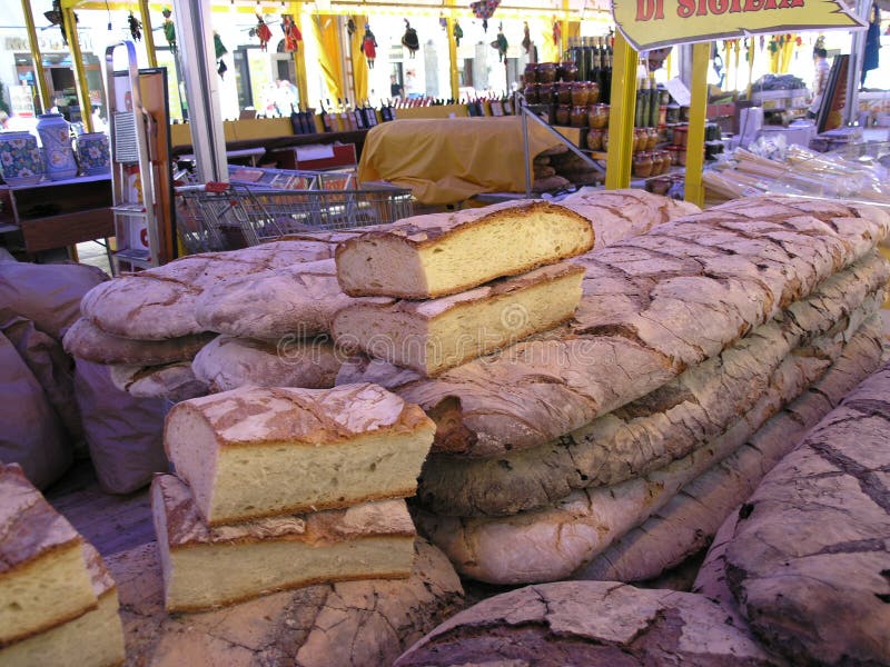 Large Loafs of Bread in Market Stock Photo - Image of italian, pile: 989300