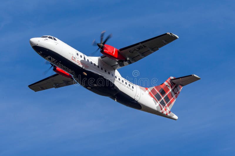 Large Loganair Plane Taking Flight from an Airport Flight Strip ...