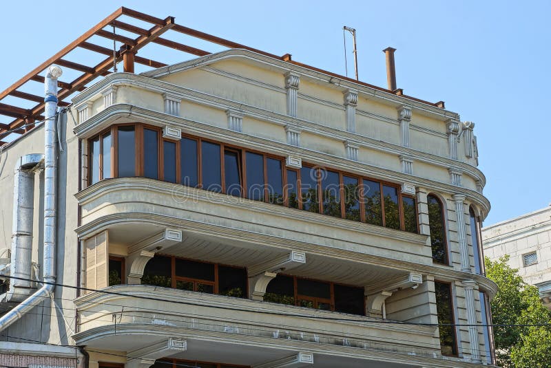 Large Long Balcony with Windows on the Gray Wall Stock Image - Image of ...