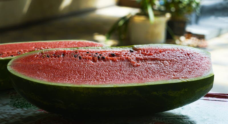 Large Long Watermelon Cut in Half Stock Image - Image of countertop ...