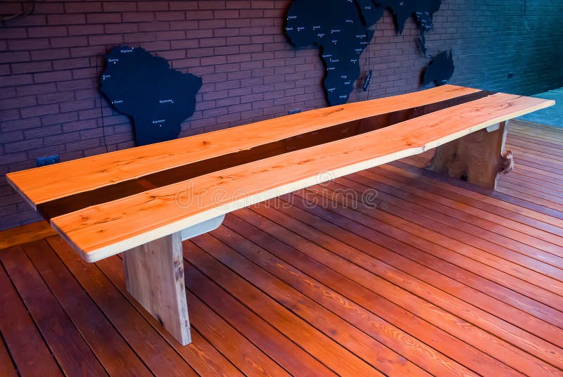 Large Long Wooden Table with Epoxy Fill in the Evening in a Modern Loft ...