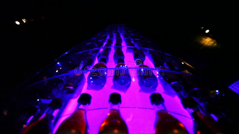 Large Luminous Bar with Many Bottles in Night Stock Video - Video of ...