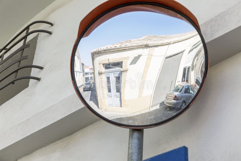 A Large Magnifying Mirror on a Dangerous Turn in the Road in a Small ...
