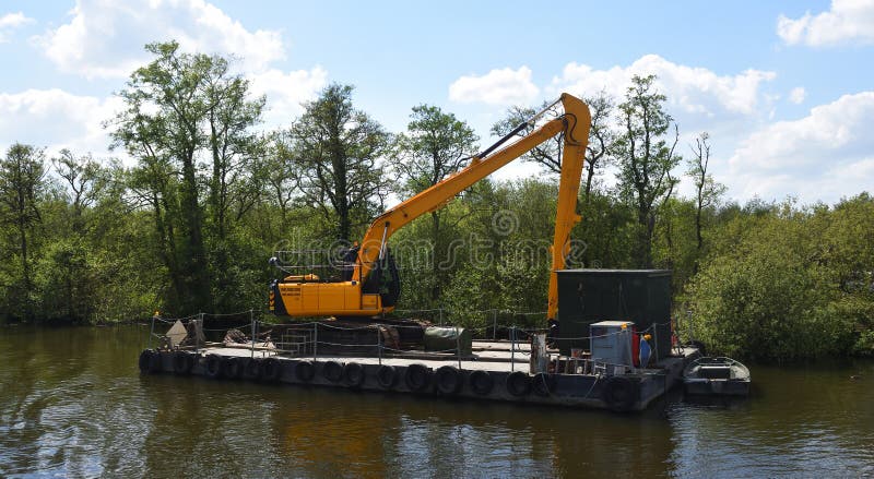 Large Mechanical Digger on Floating Pontoon Stock Image - Image of ...