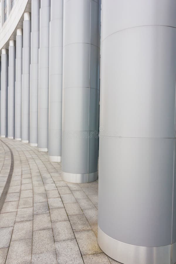 Large white metal columns stock photo. Image of bright - 52424618
