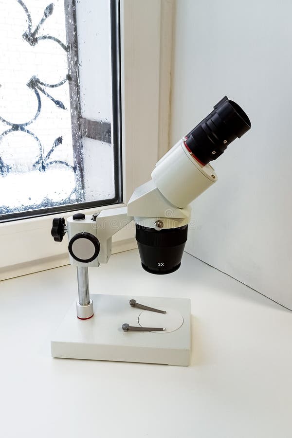 Large Metal Microscope on a Gray Background Stock Image - Image of ...